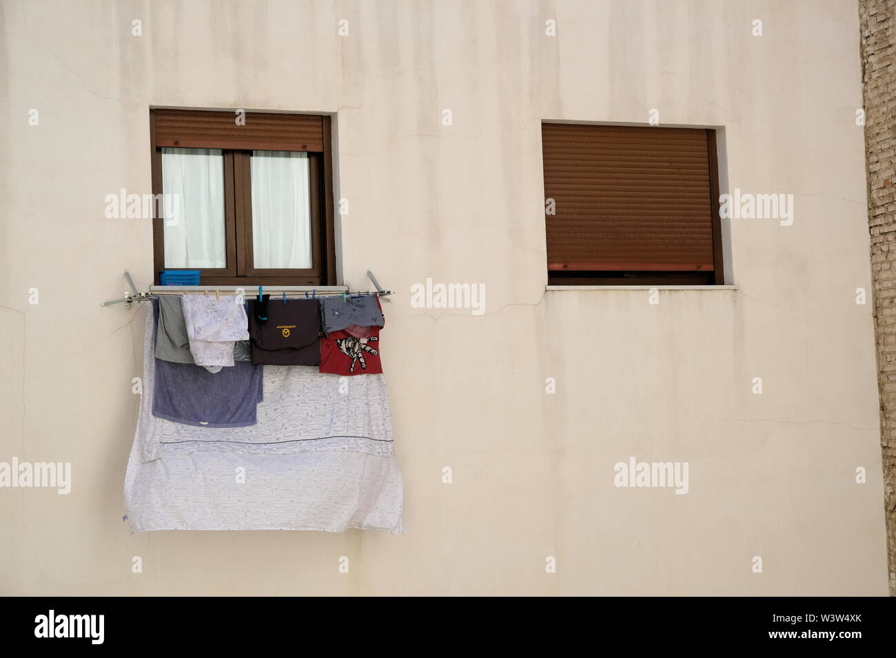 Laundry drying outside windows hi-res stock photography and images - Alamy