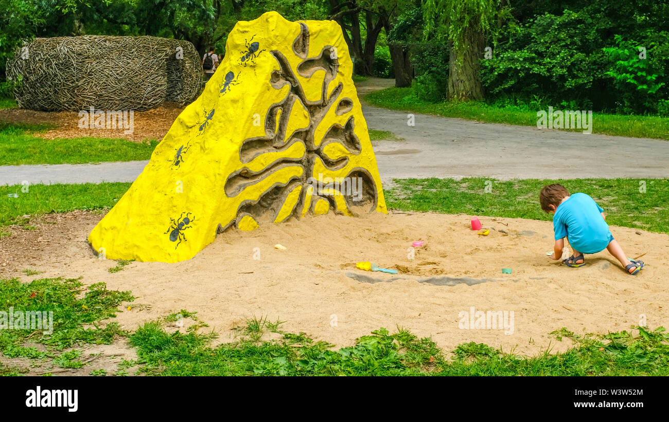 Child having fun at Nature is Your Shelter Exhibit at Montreal's ...
