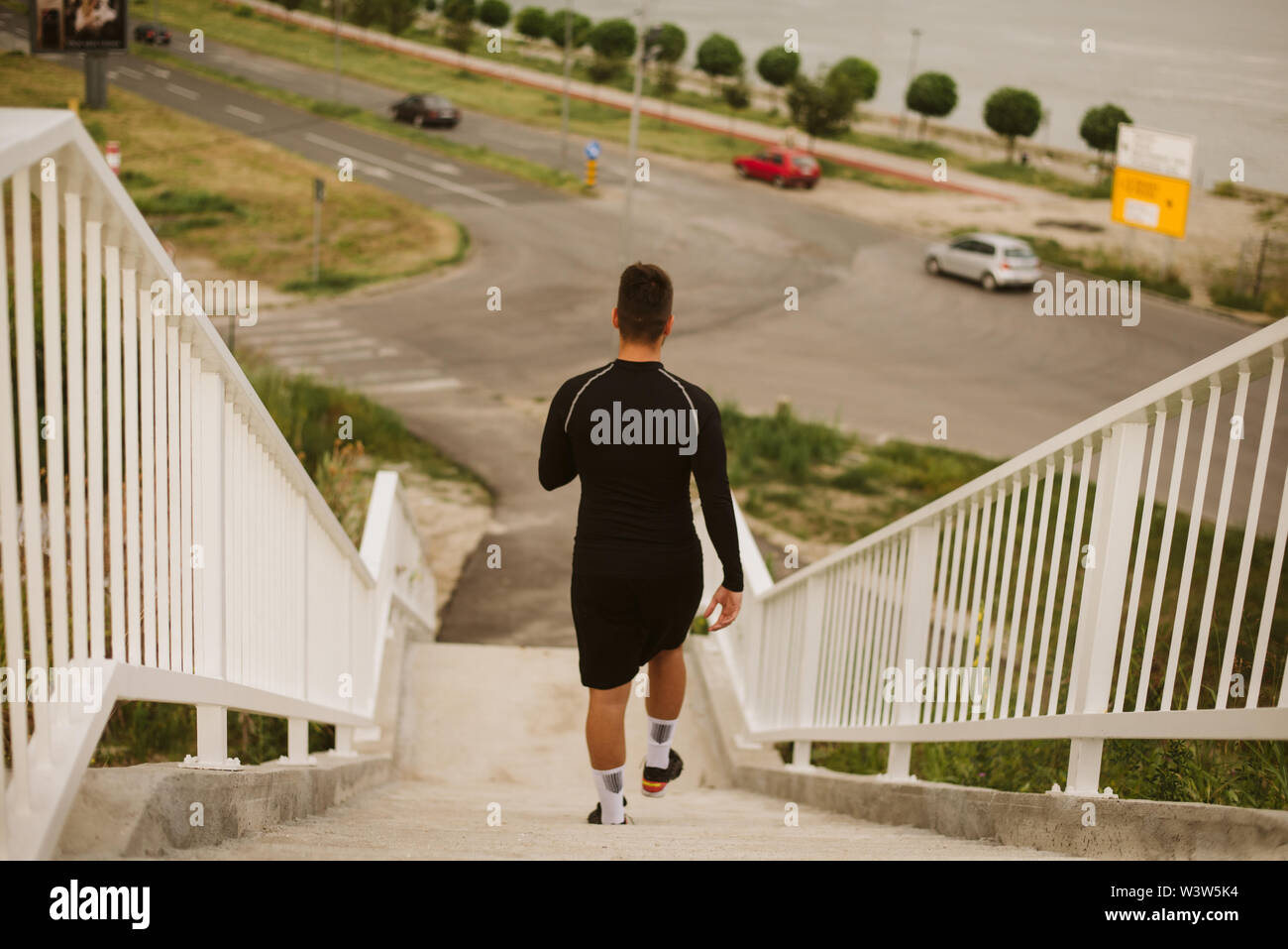 Athletic Man Doing Running Exercise Stock Photo - Alamy