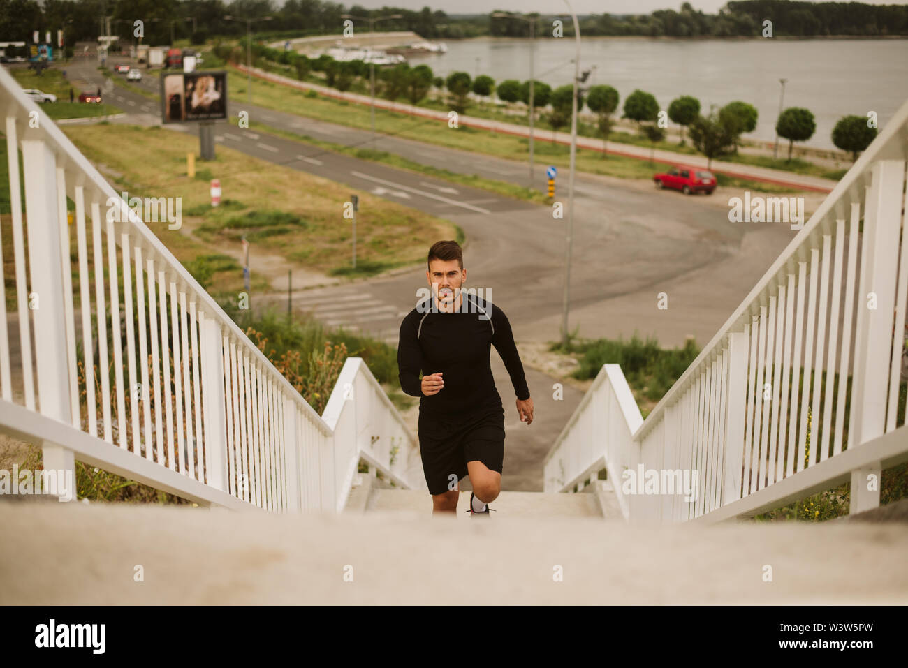 Athletic Man Doing Running Exercise Stock Photo - Alamy