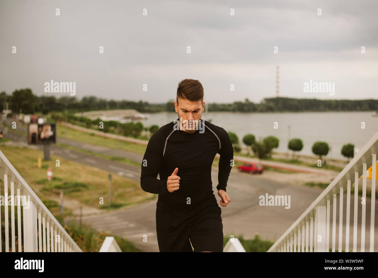 Athletic Man Doing Running Exercise Stock Photo - Alamy