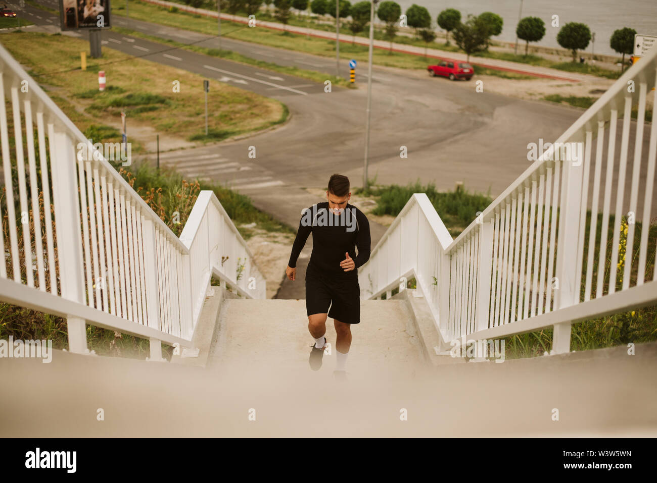 Athletic Man Doing Running Exercise Stock Photo - Alamy