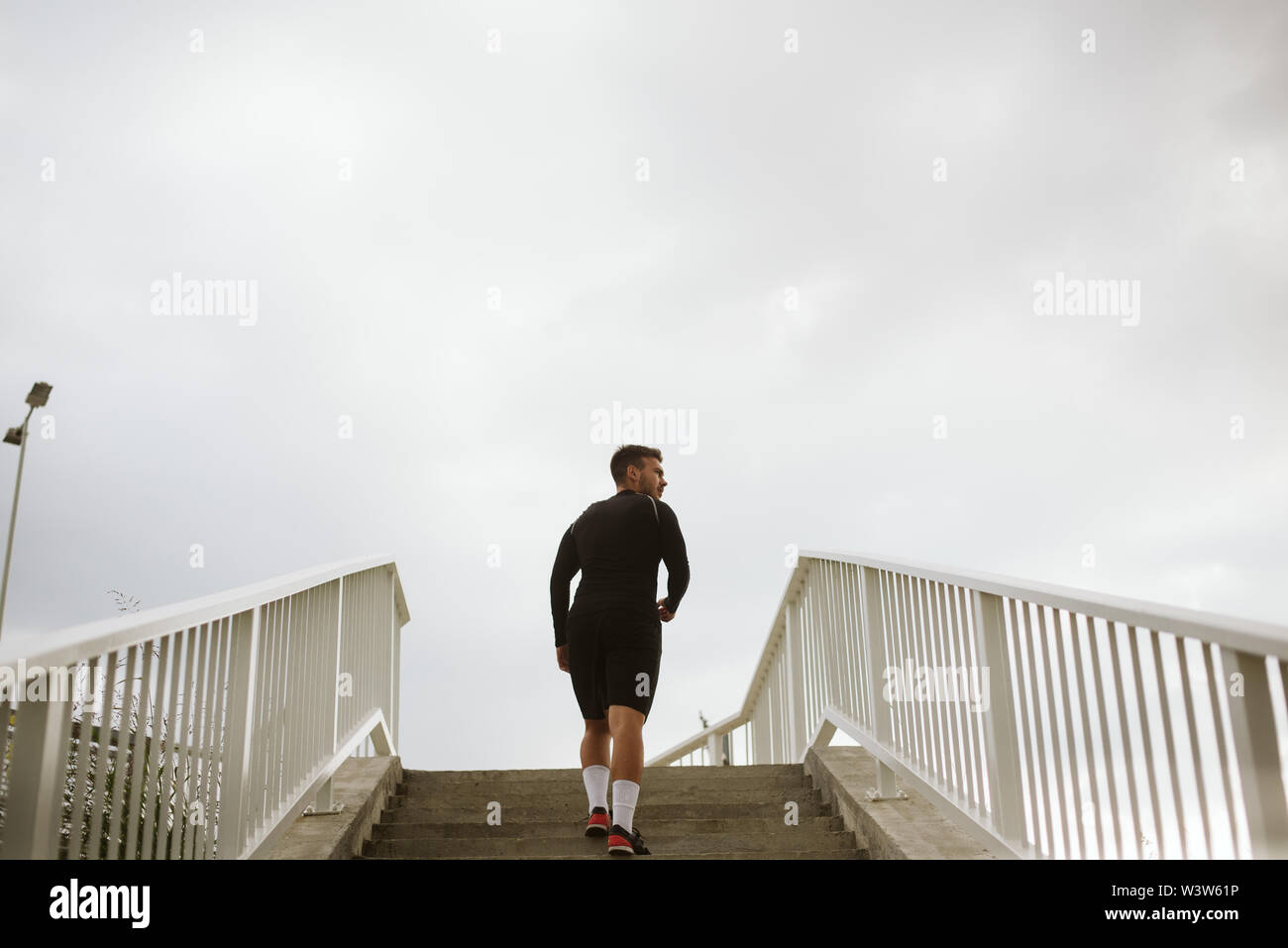 Athletic Man Doing Running Exercise Stock Photo - Alamy