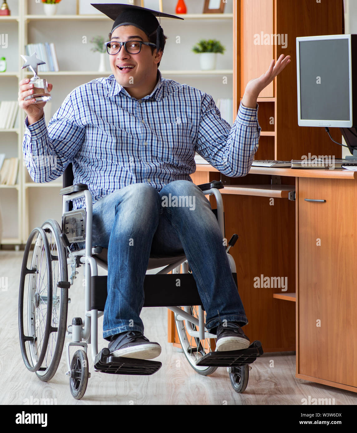 The disabled student studying at home on wheelchair Stock Photo - Alamy