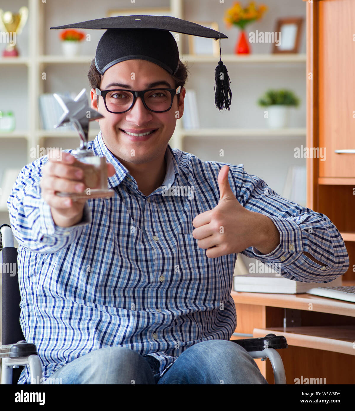 The disabled student studying at home on wheelchair Stock Photo - Alamy