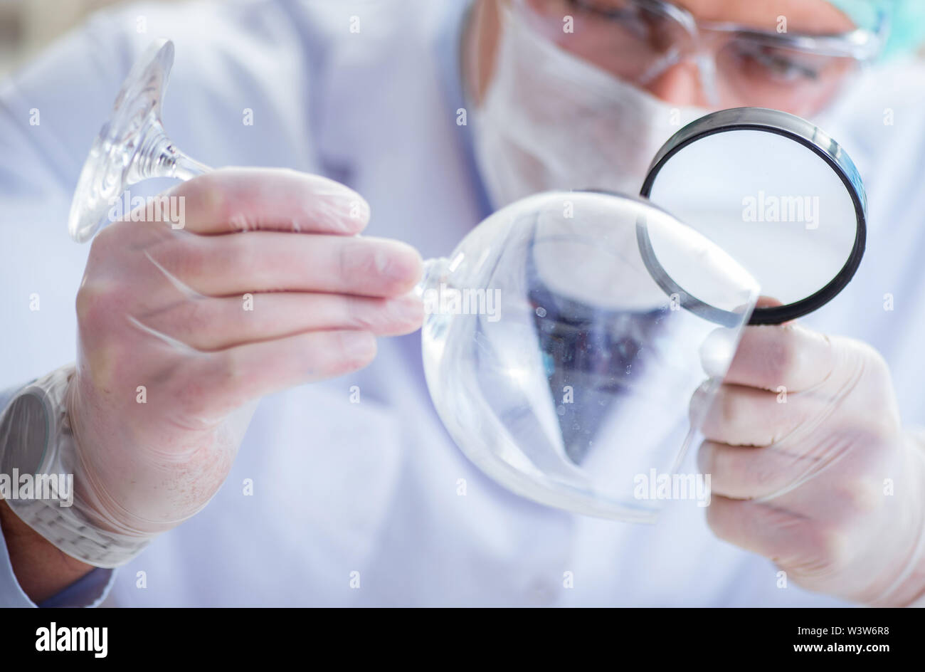 The forensics investigator working in lab on crime evidence Stock Photo ...