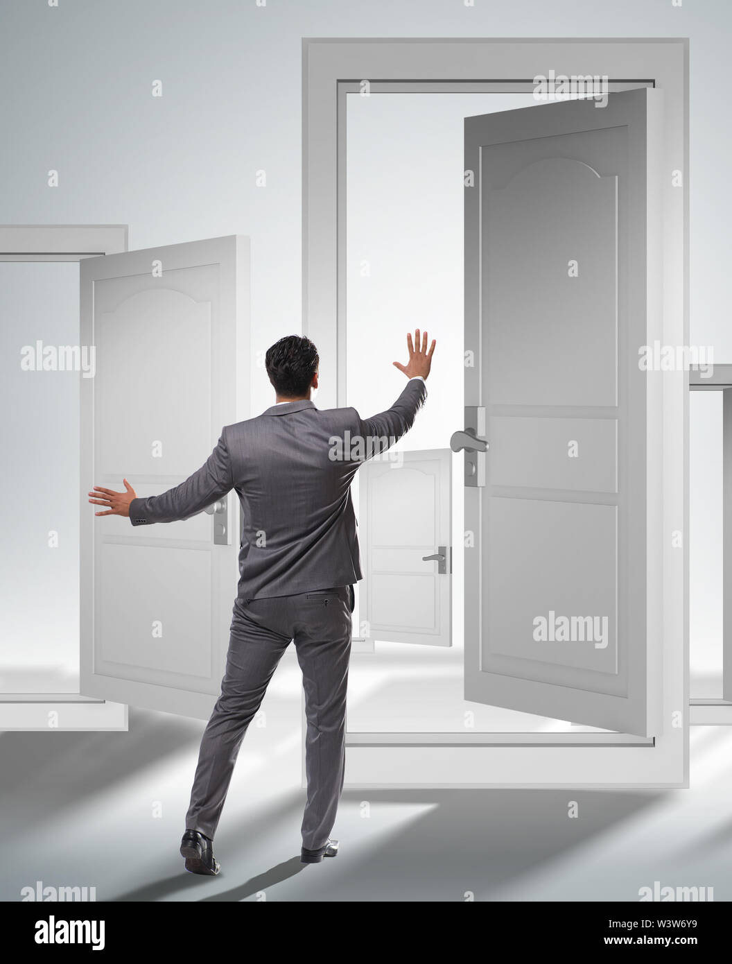 The businessman facing many business opportunities Stock Photo - Alamy