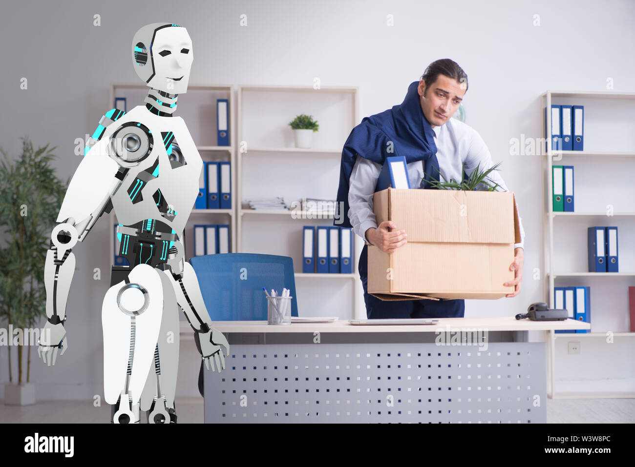The concept of robots replacing humans in offices Stock Photo - Alamy