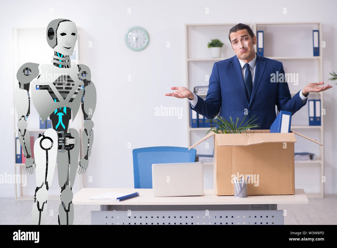 The concept of robots replacing humans in offices Stock Photo - Alamy