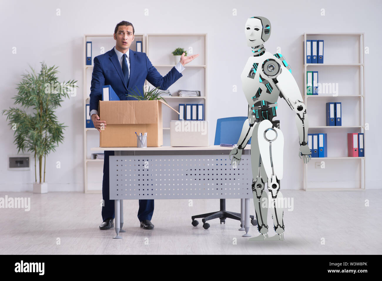 The concept of robots replacing humans in offices Stock Photo - Alamy