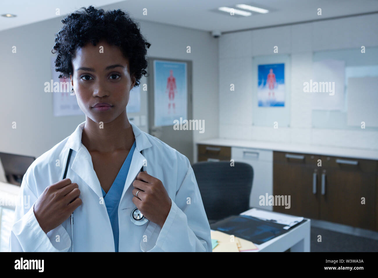 Female doctor looking at camera in the hospital Stock Photo - Alamy