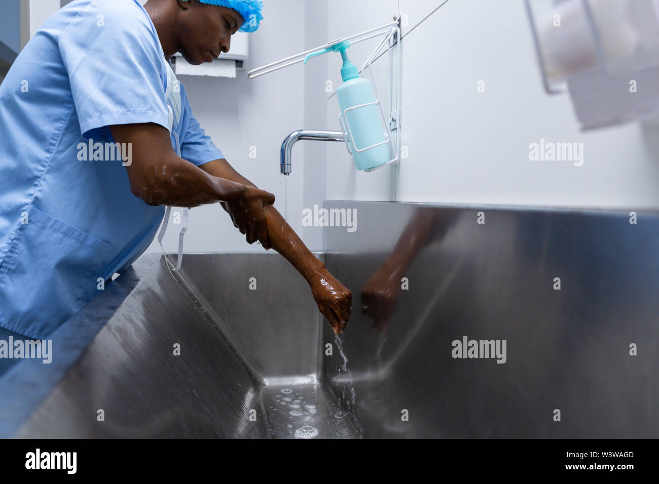 Male surgeon washing hands in sink at hospital Stock Photo - Alamy