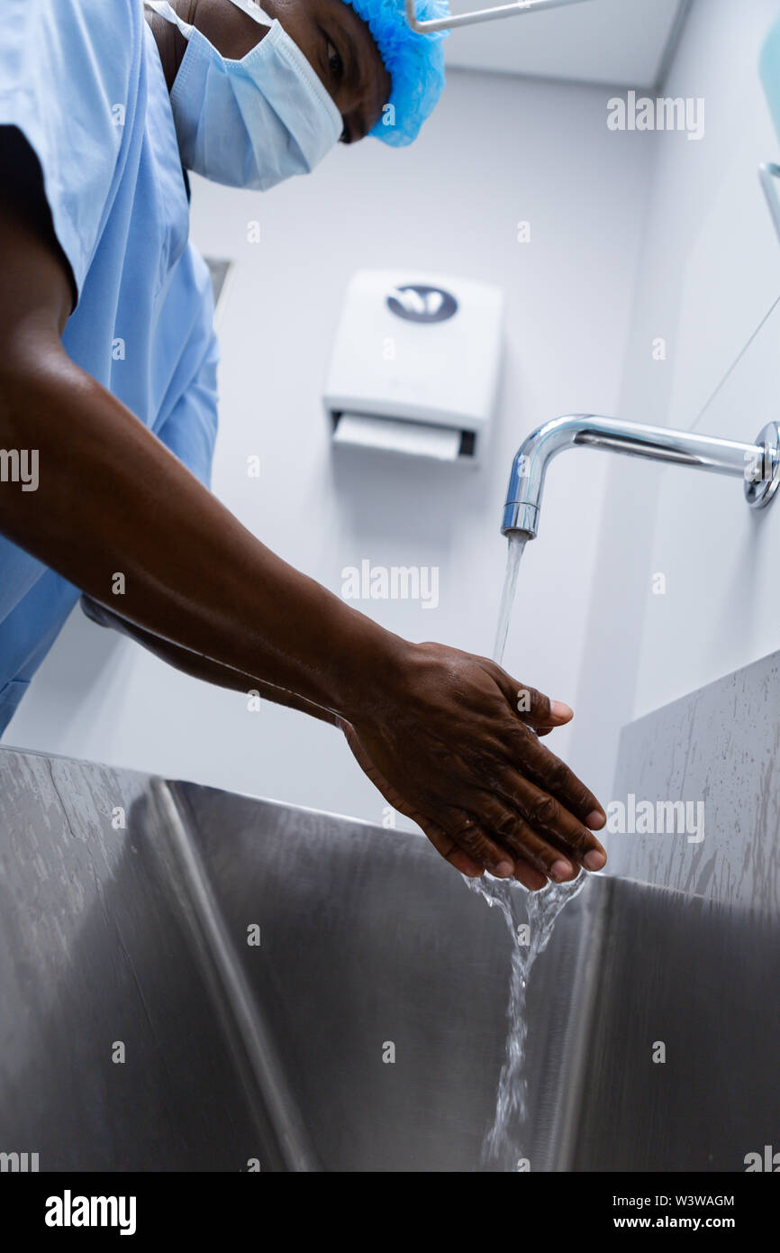 Male surgeon washing hands in sink at hospital Stock Photo - Alamy