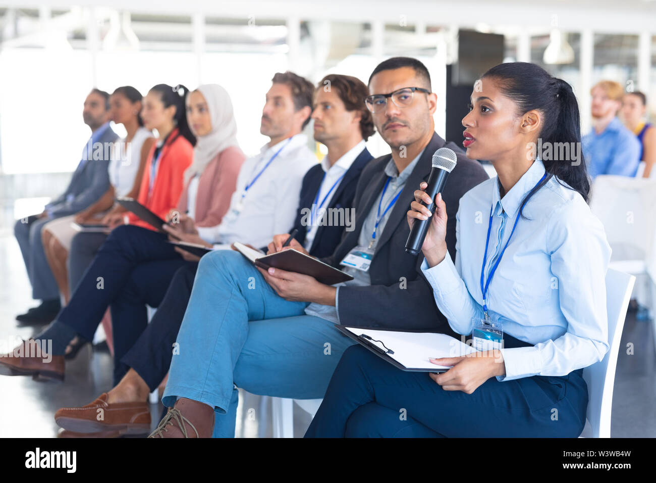 Woman asking question during hi-res stock photography and images - Alamy