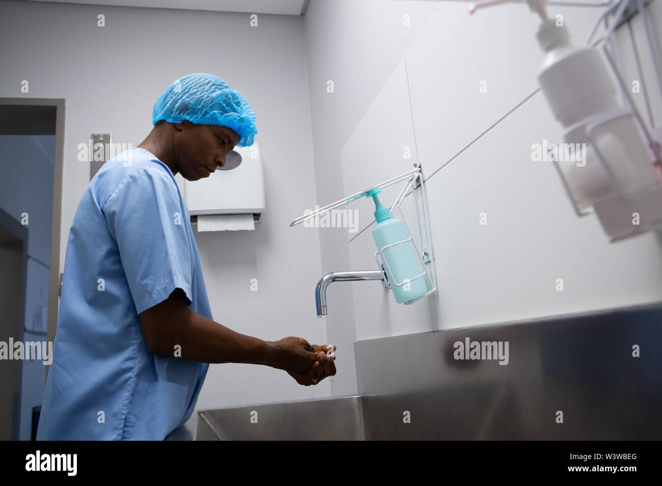 Male surgeon washing hands in sink at hospital Stock Photo - Alamy