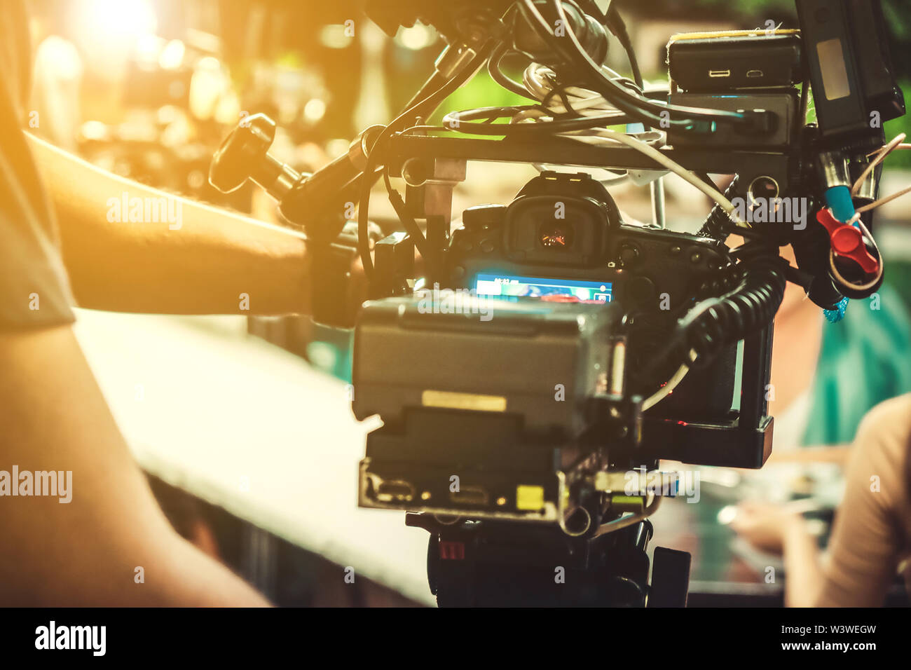 Behind the scene. cameraman shooting film scene with camera Stock Photo ...