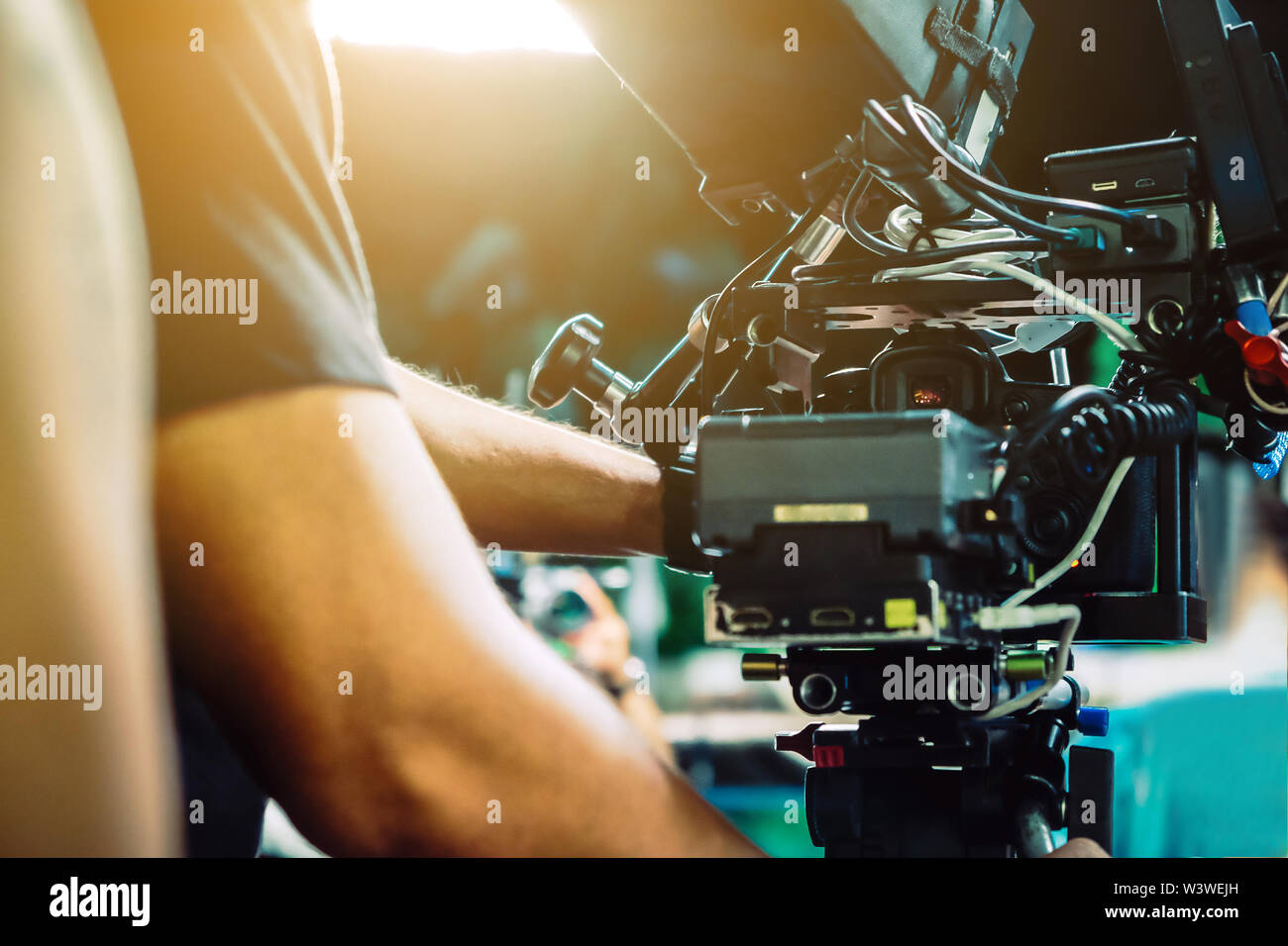 Behind the scene. cameraman shooting film scene with camera Stock Photo ...
