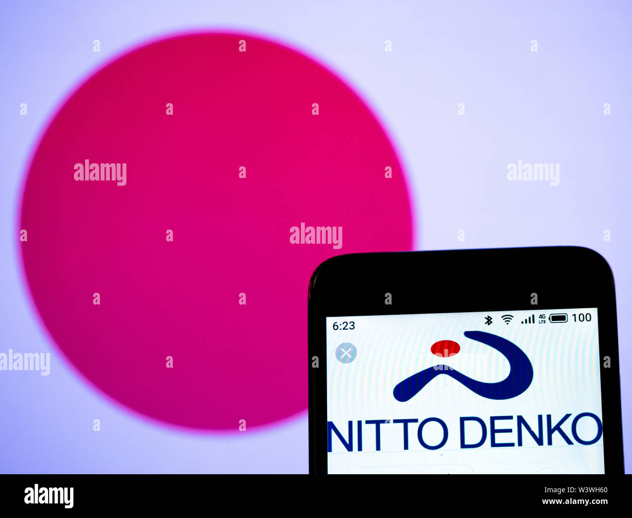 In this photo illustration the Nitto Denko Corporation logo is seen ...