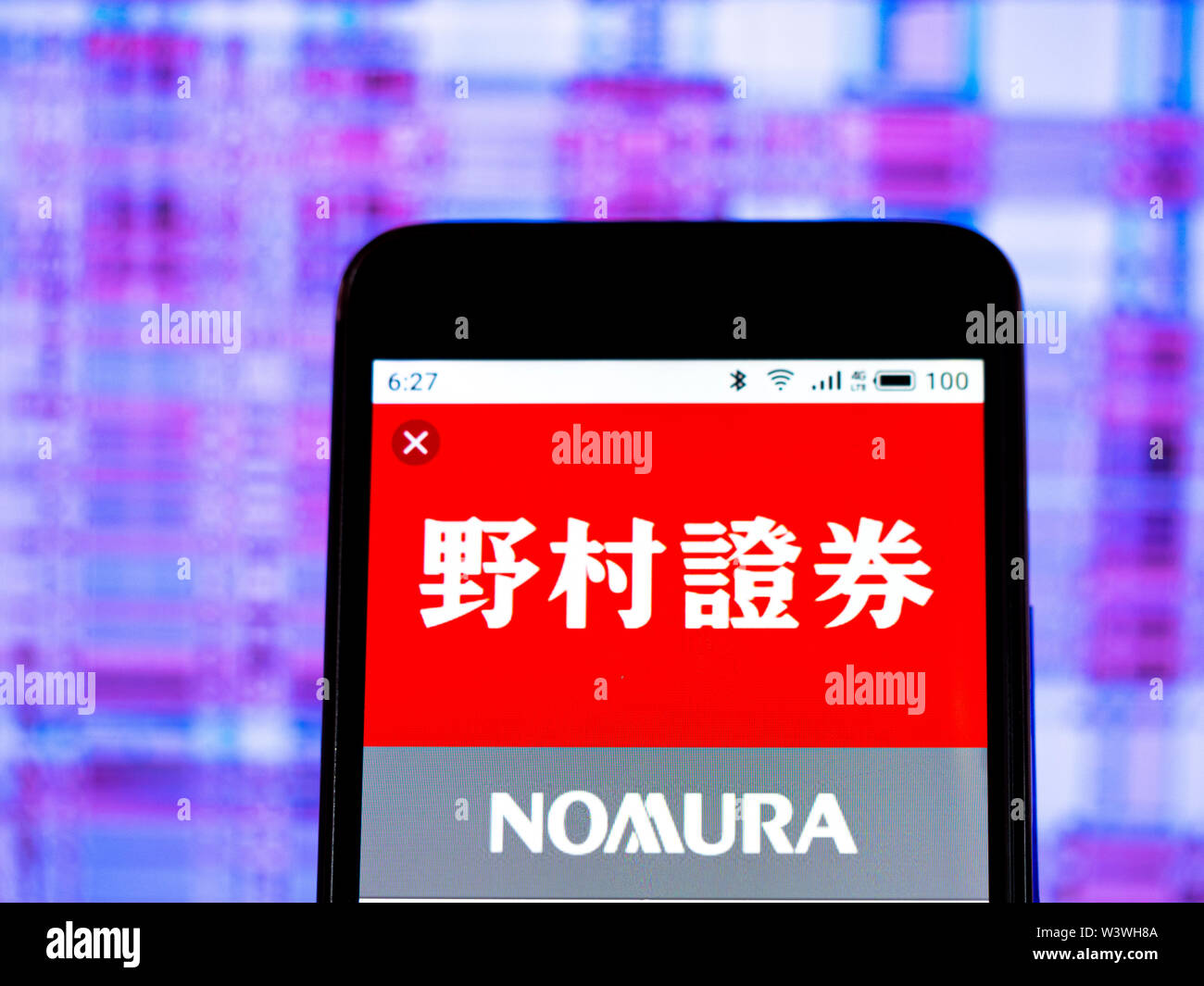 In this photo illustration the Nomura Holdings, Inc. logo is seen ...