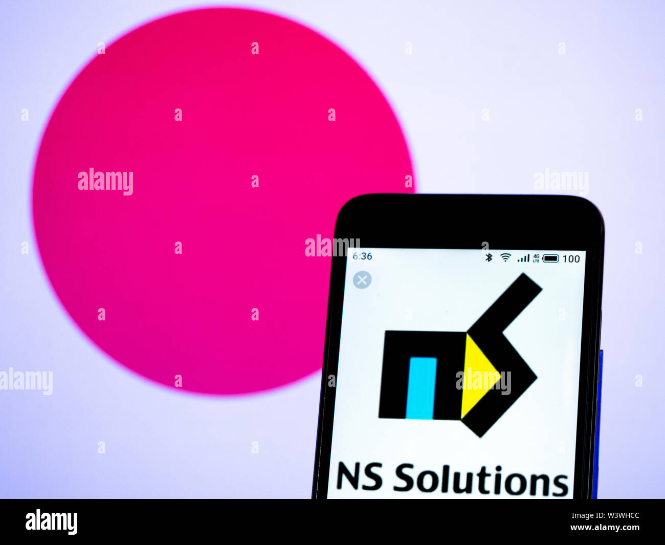 In this photo illustration the NS Solutions Corp. logo is seen ...