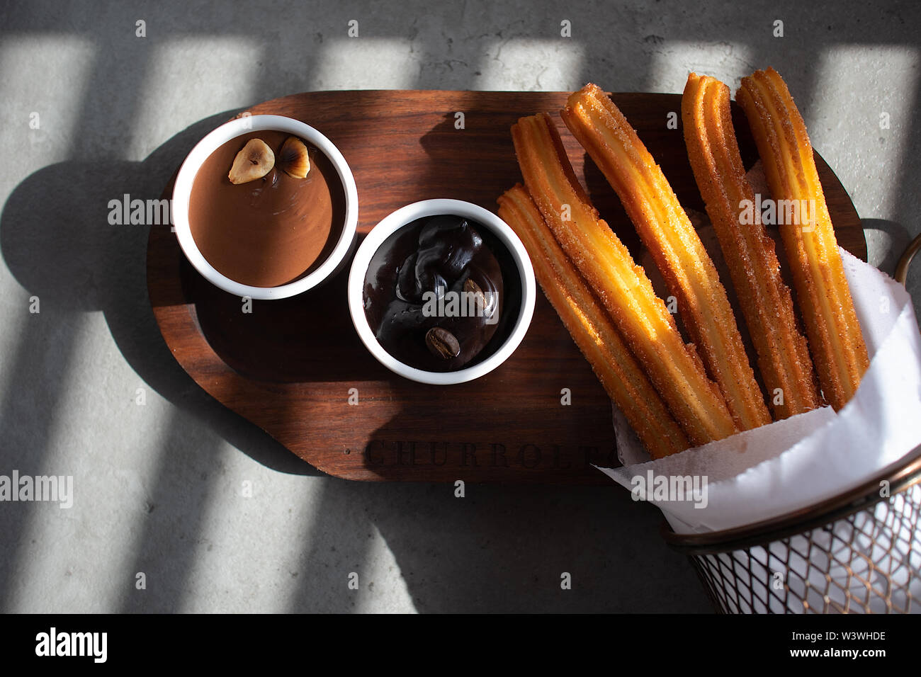 Churros with Nutella Stock Photo - Alamy