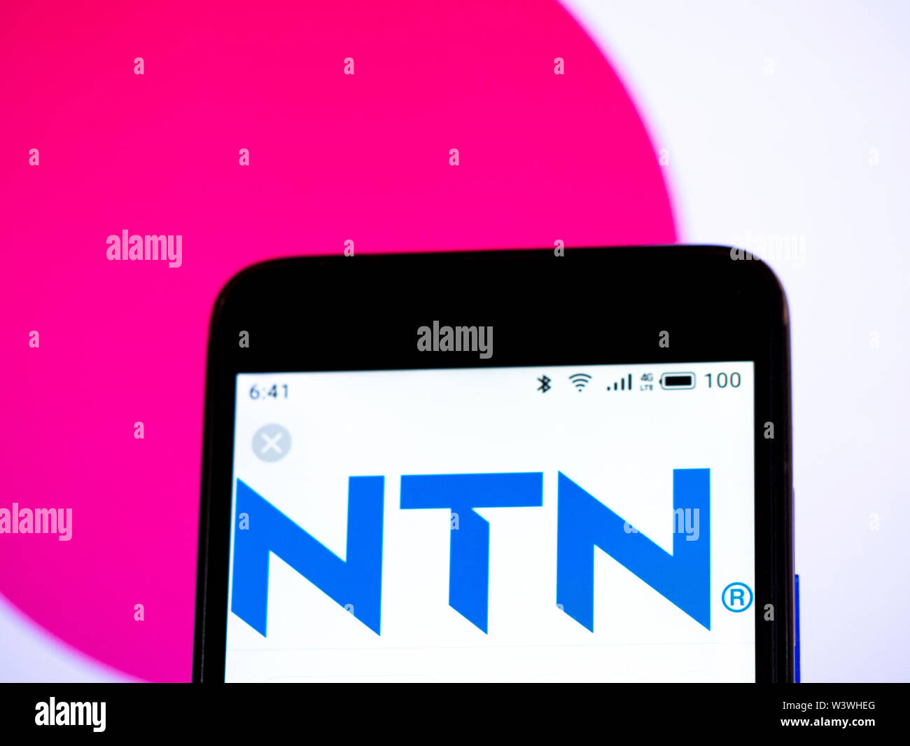 In this photo illustration the NTN Corporation logo is seen displayed ...
