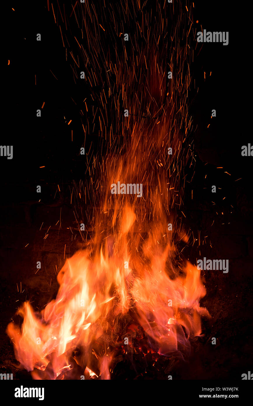 Traditional blacksmith furnace with burning fire Burning fire in ...