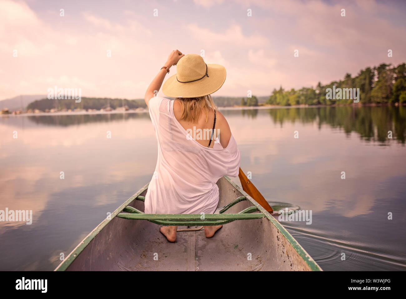 Woman Canoes Through Somes Sound in Maine Stock Photo - Alamy