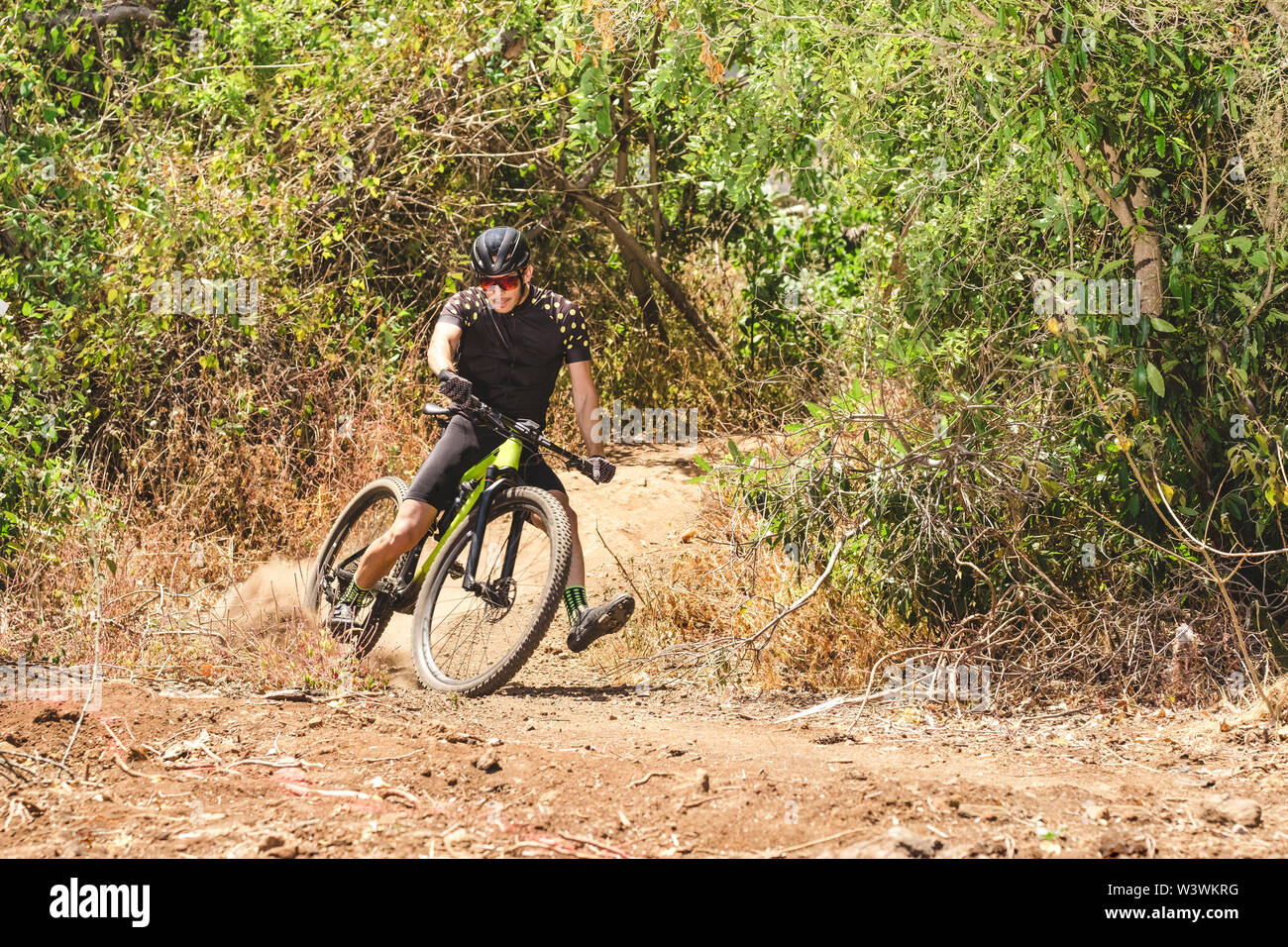 Action photo of male mountain bike cyclist on trail Stock Photo - Alamy