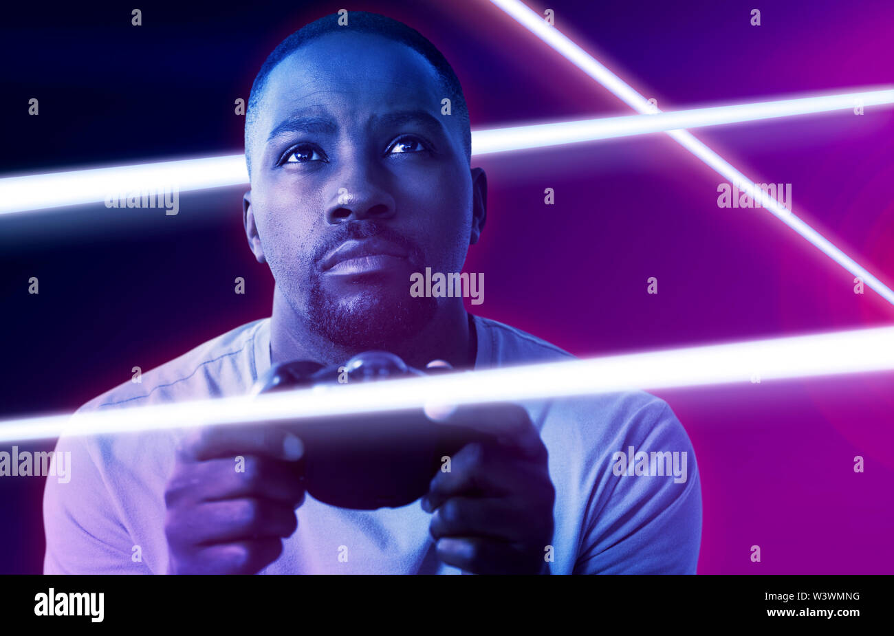 Composite image of man playing video game against white background ...