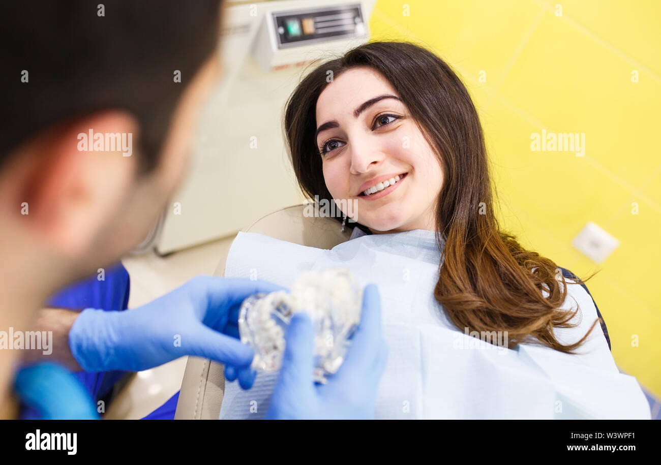 The patient caring for teeth in the dental clinic Stock Photo - Alamy