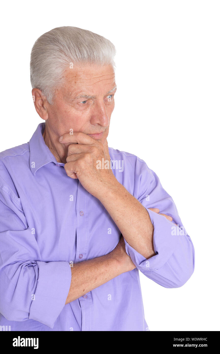 Thinking senior man isolated on white background Stock Photo - Alamy