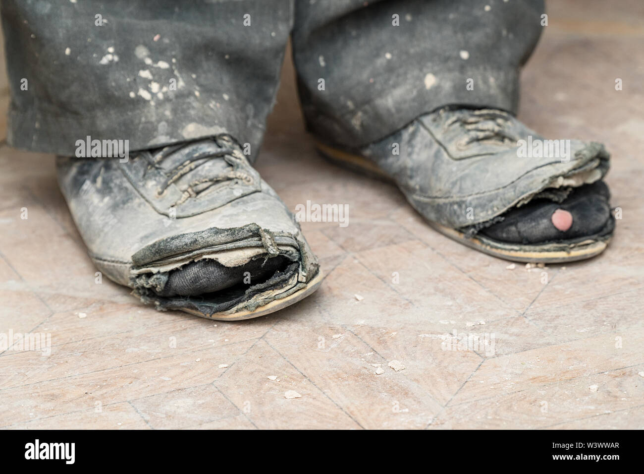Torn Shoes High Resolution Stock Photography and Images - Alamy