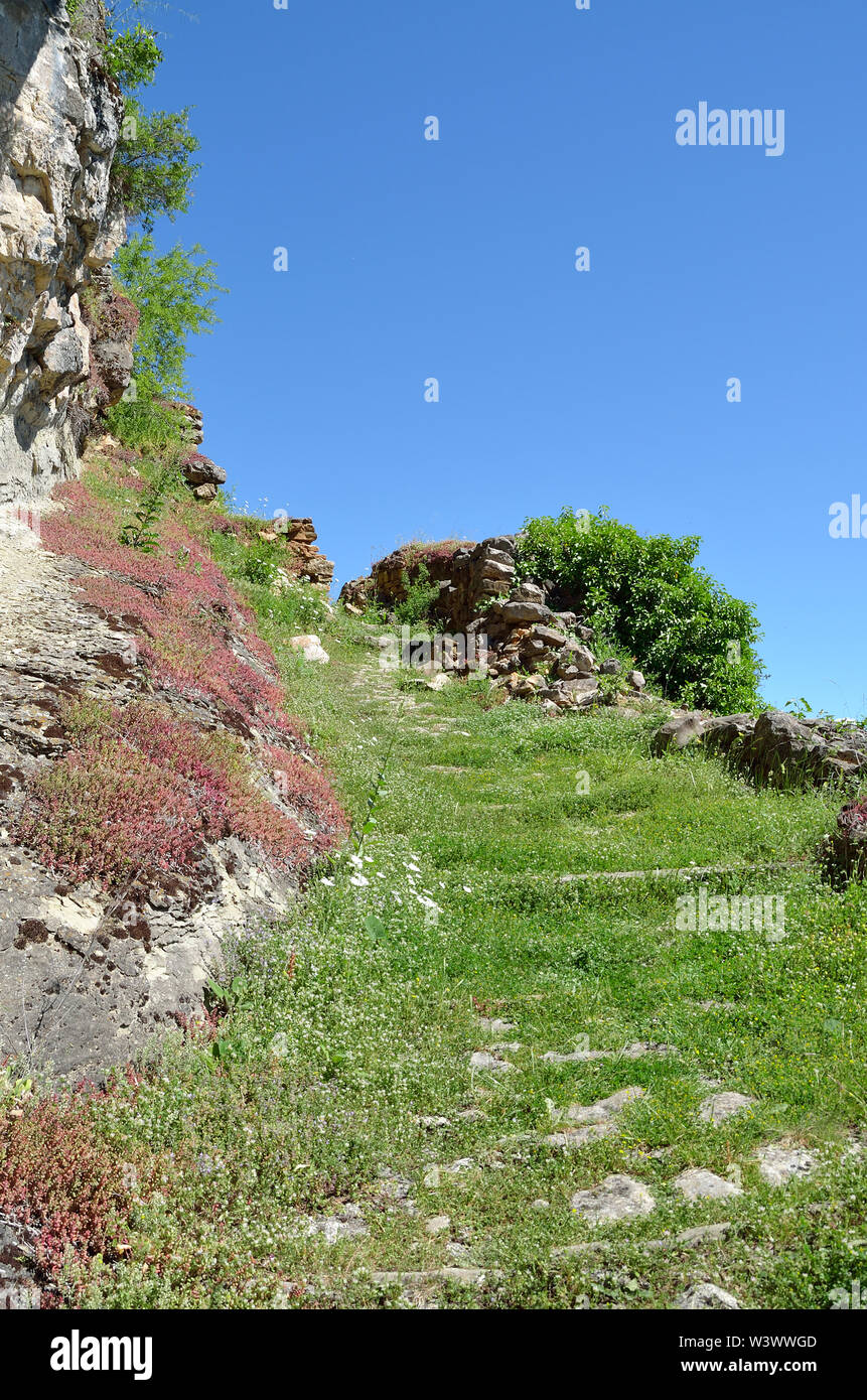 Narrow pathway on the clif-side Stock Photo - Alamy