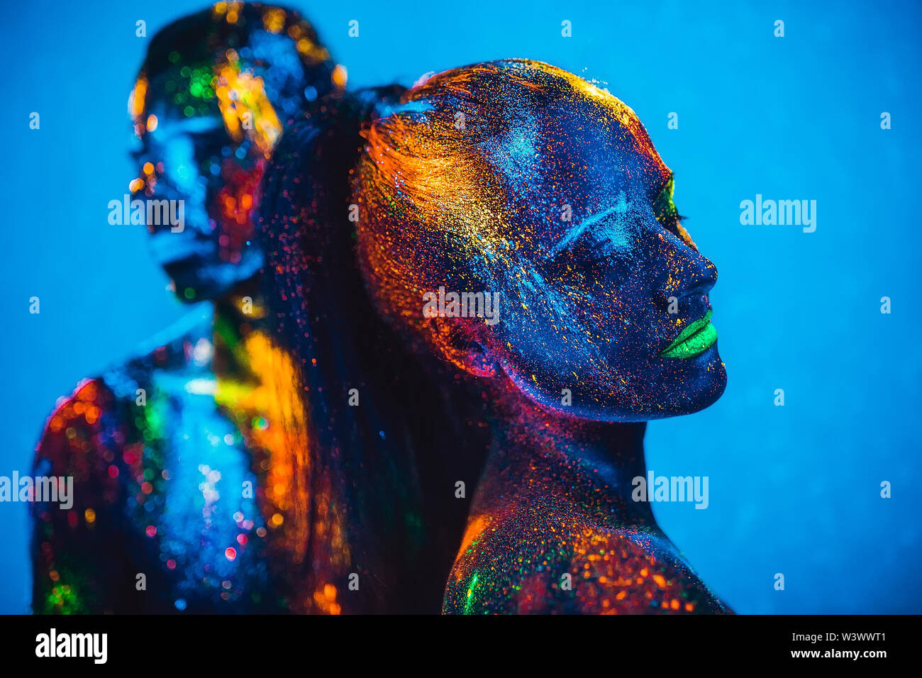 People colored fluorescent powder hi-res stock photography and images ...