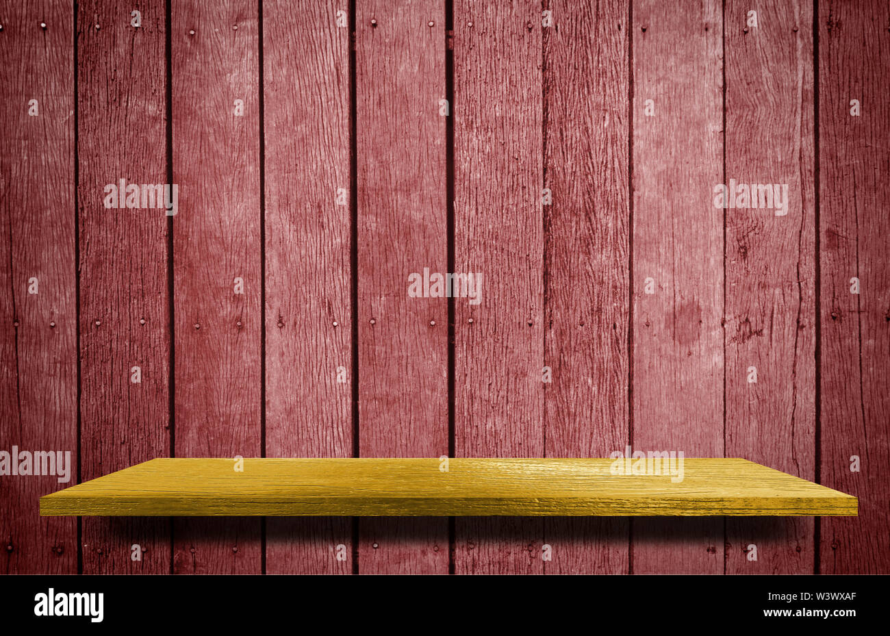 Yellow wooden on red product display shelf table top copy space ...