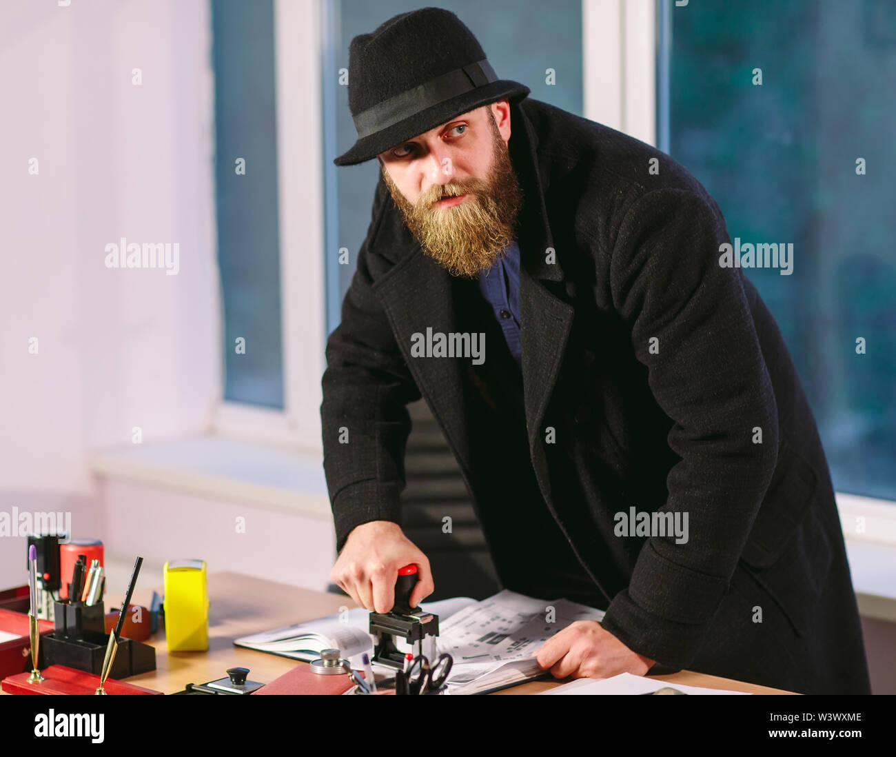 Concept. Thief steals in the office. Spy in the office Stock Photo - Alamy