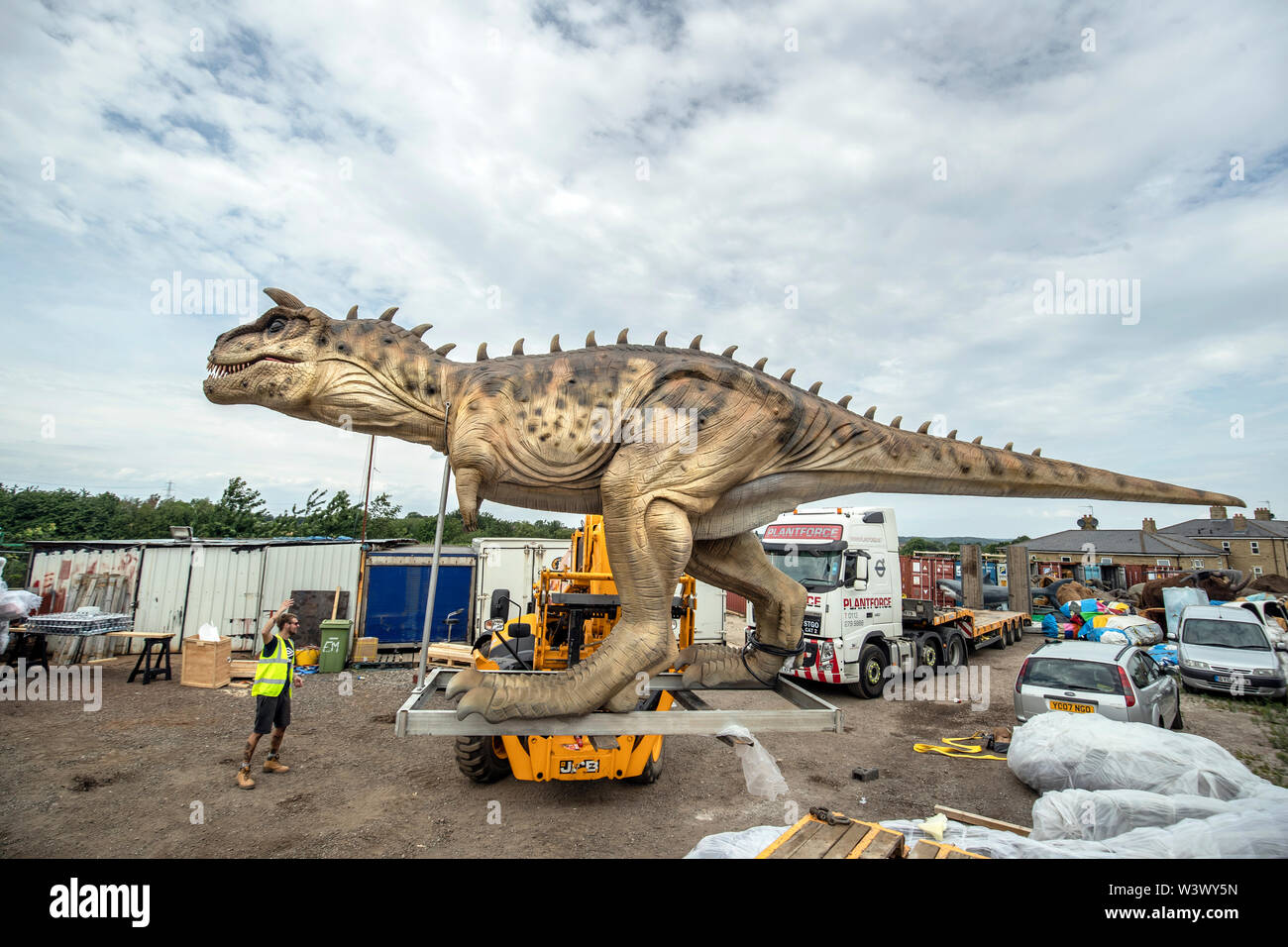 An 8m long animatronic Carnotaurus dinosaur is unpacked from a shipping ...
