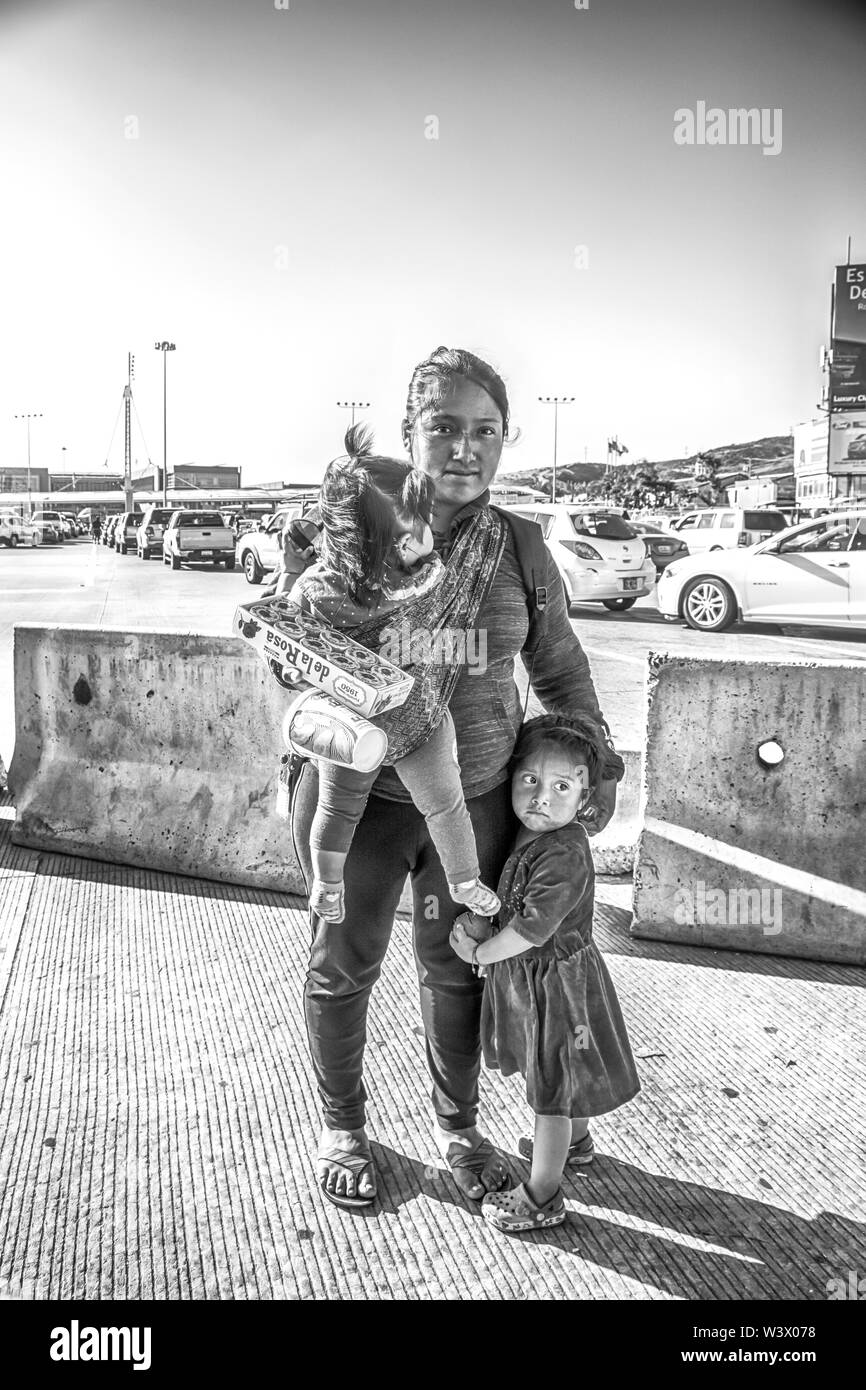Tijuana border mexico family Black and White Stock Photos & Images - Alamy