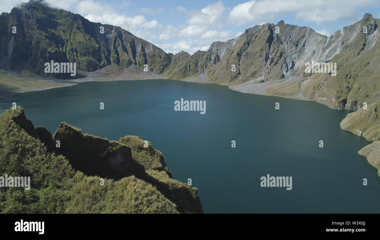 Crater lake of the volcano Pinatubo among the mountains, Philippines ...