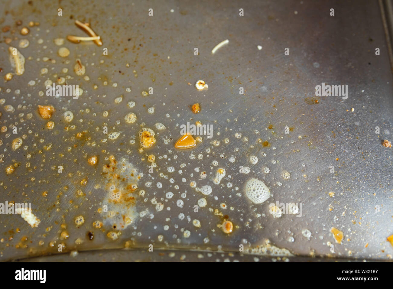 Washing process of gas cooker.Close-up of dirty gas cooker covered with ...