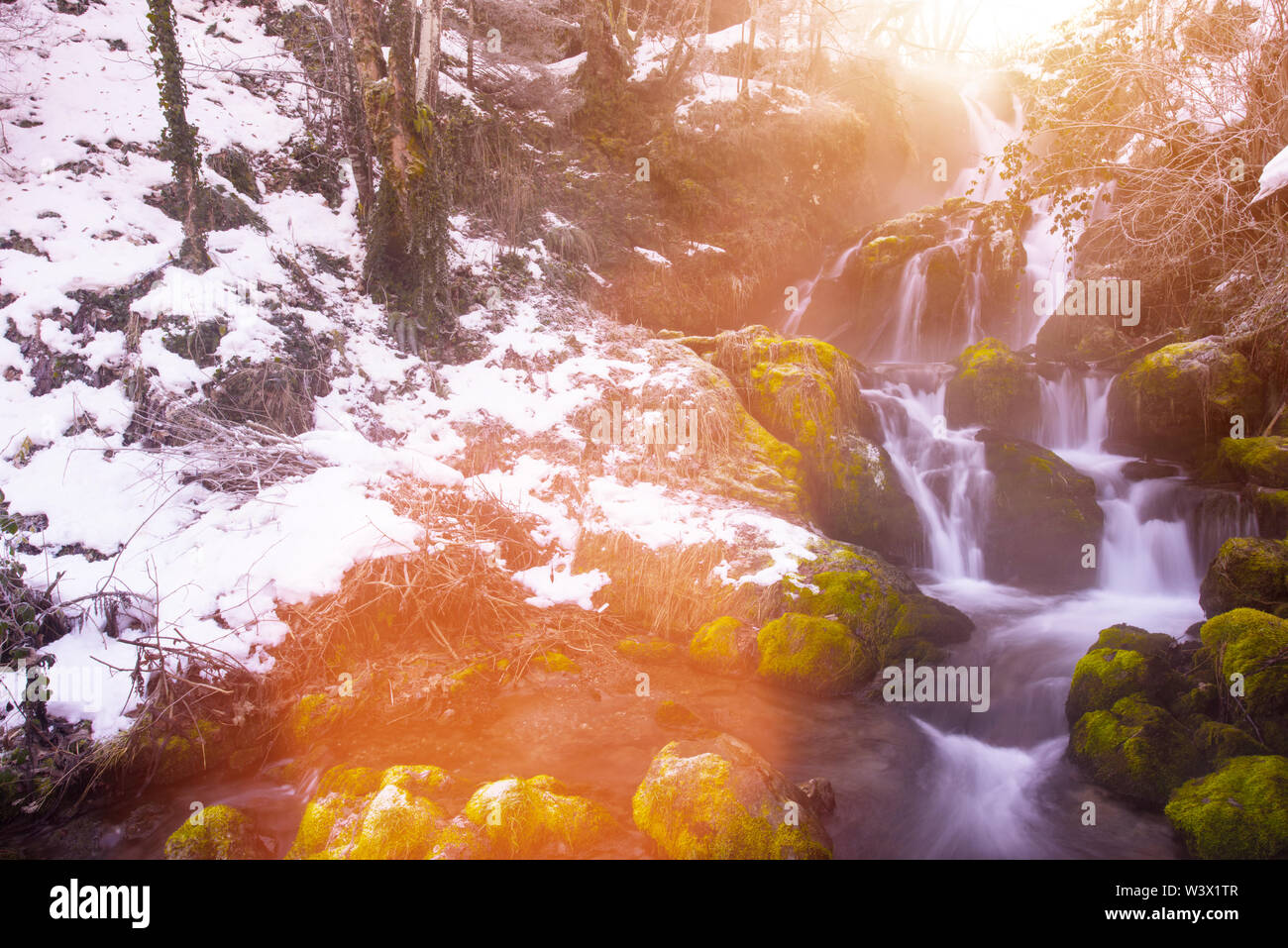 Amazing nature landscape, beautiful waterfall with sunlight in deep ...