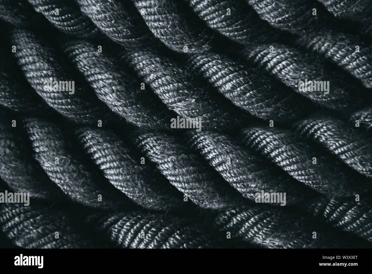 Close up of black battle rope for functional training. Sport and ...