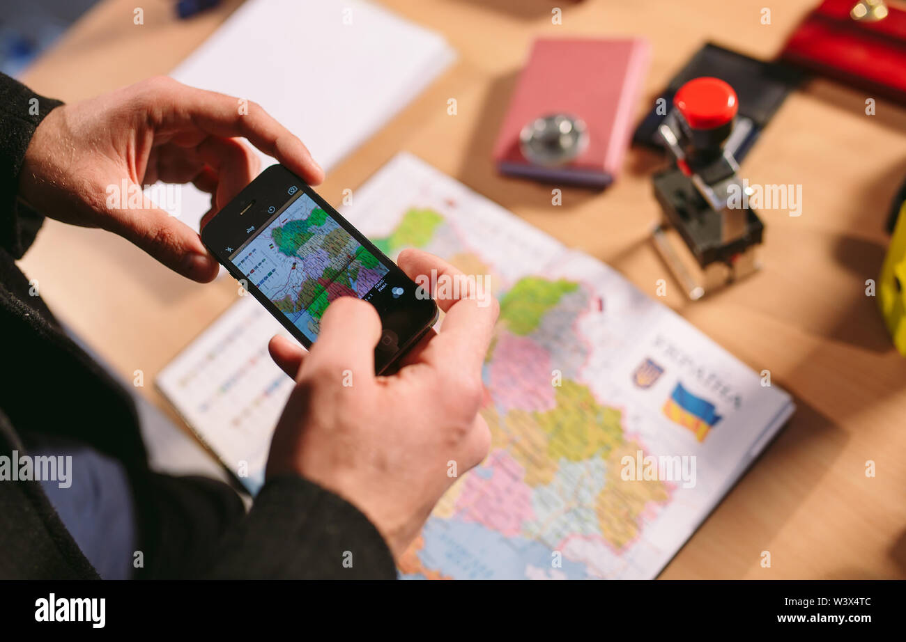 Concept. Spy takes on the photo documents. Thief in the office Stock ...