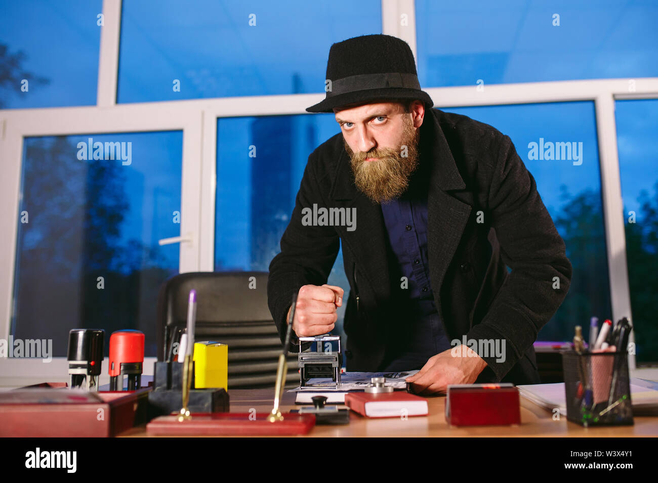 Concept. Thief steals in the office. Spy in the office Stock Photo - Alamy