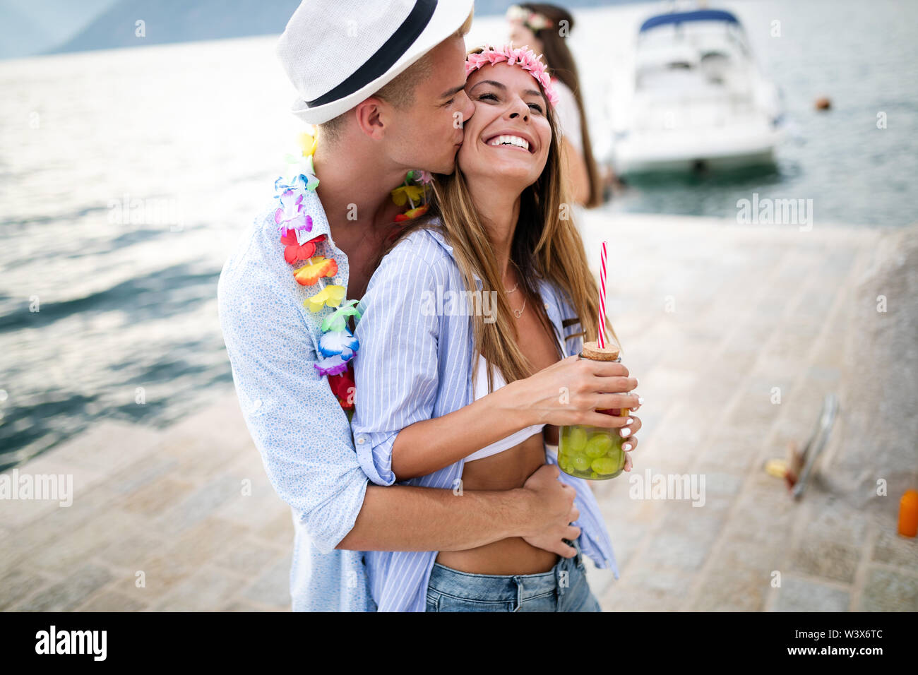Couple hugging party hi-res stock photography and images - Alamy