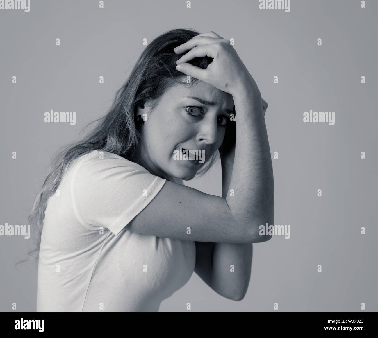 Close up of young woman feeling scared and shocked making fear, anxiety ...
