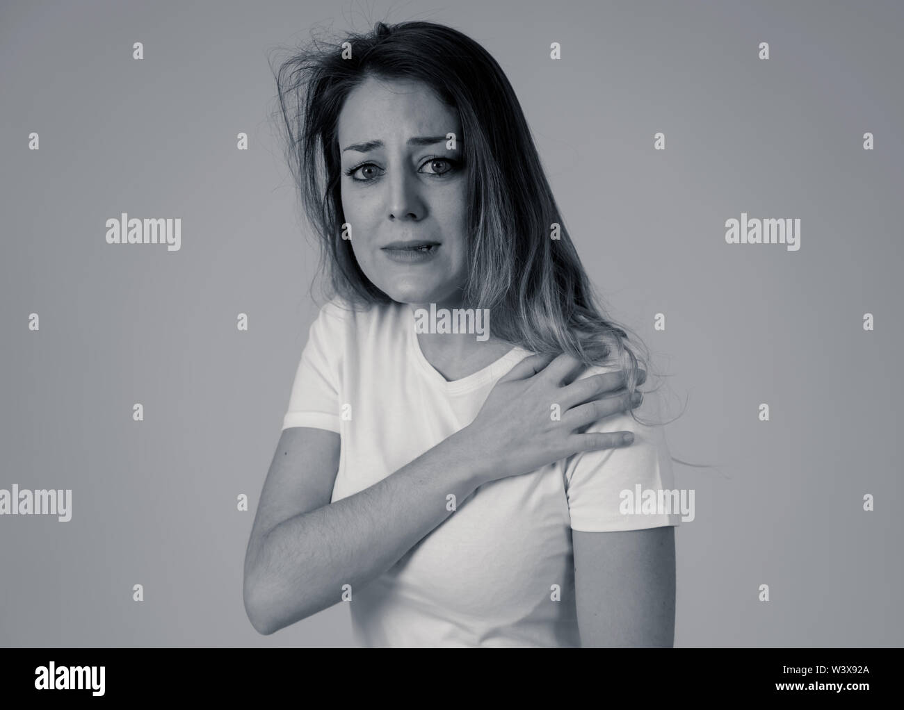 Close up of young woman feeling scared and shocked making fear, anxiety ...