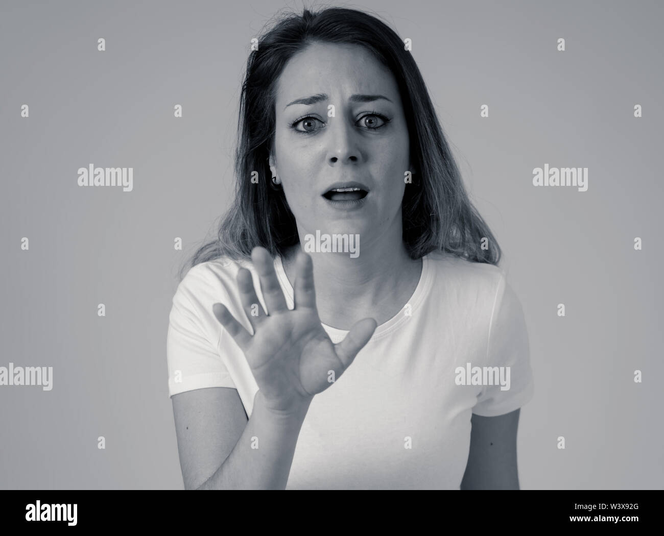 Close up of young woman feeling scared and shocked making fear, anxiety ...