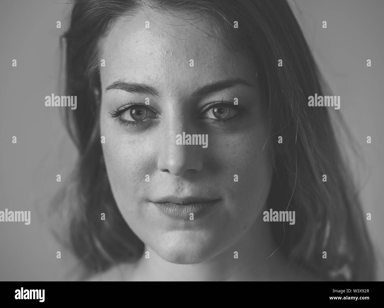 Close up portrait of attractive young caucasian woman with happy face ...